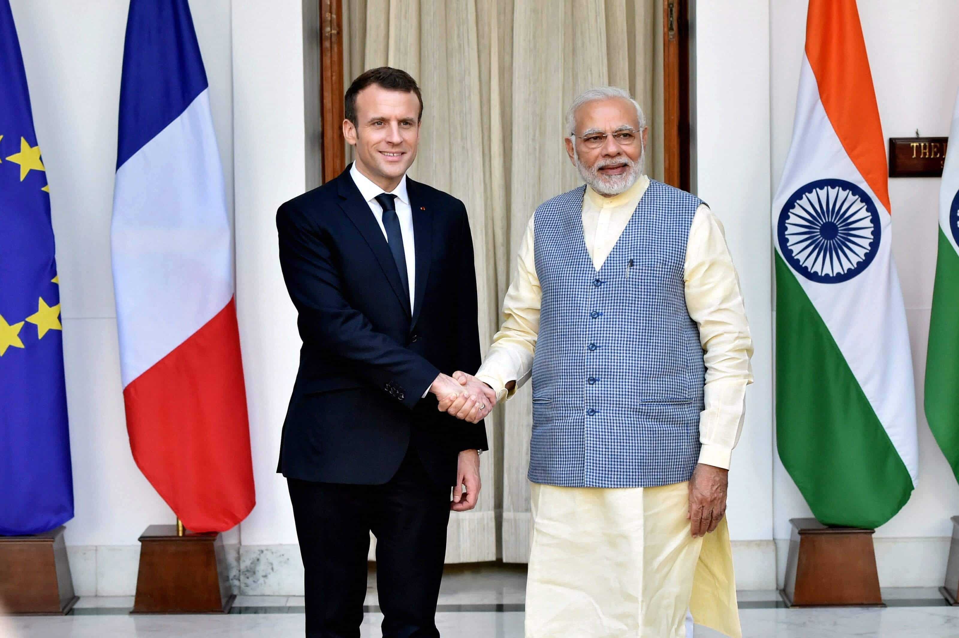 Emmanuel Macron takes dig at Donald Trump; hails efforts of India | Zee ...