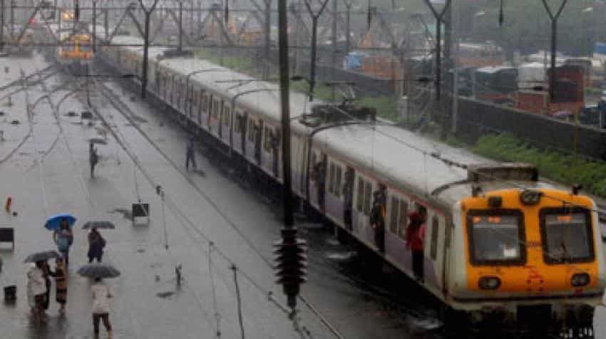 Heavy rains create chaos in Mumbai: Western Railway halts 12 express ...