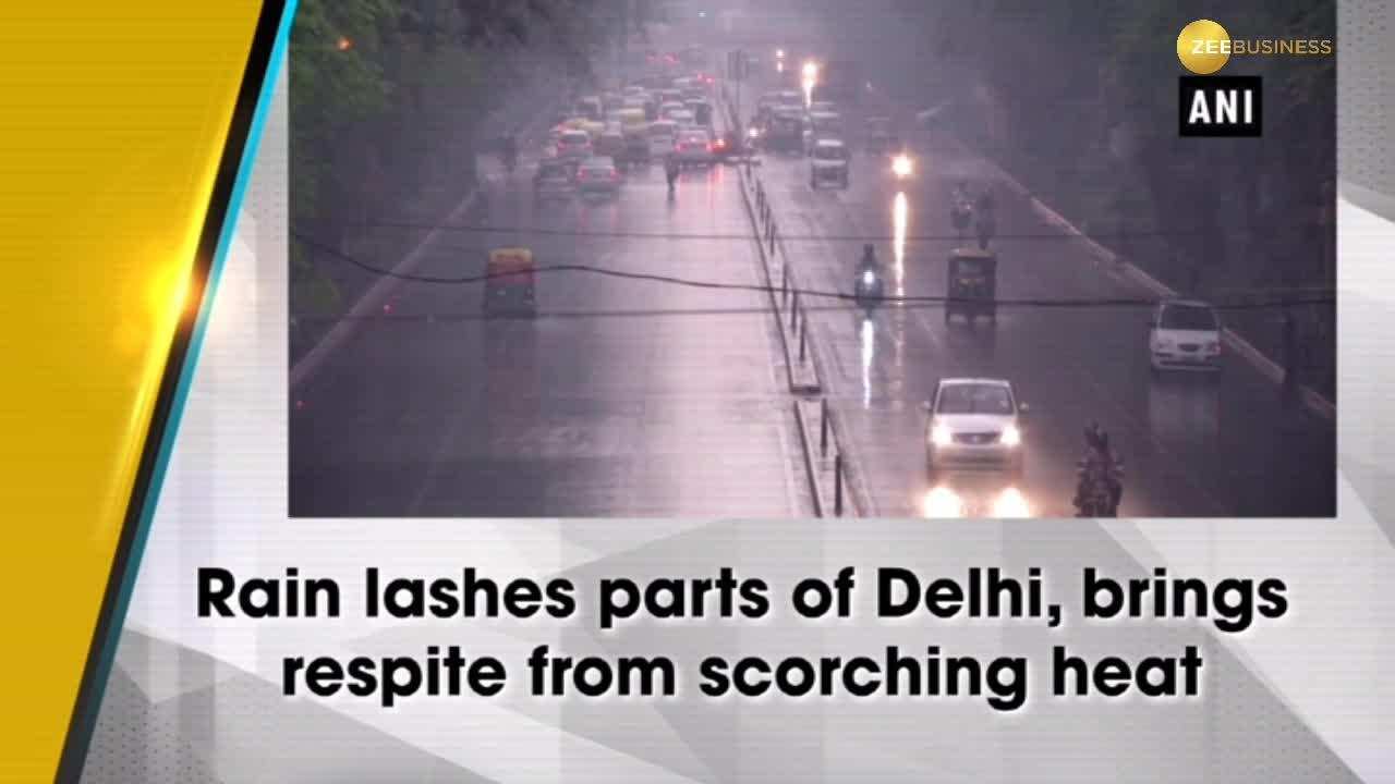 Rain lashes parts of Delhi-NCR, brings respite from scorching heat | Zee Business