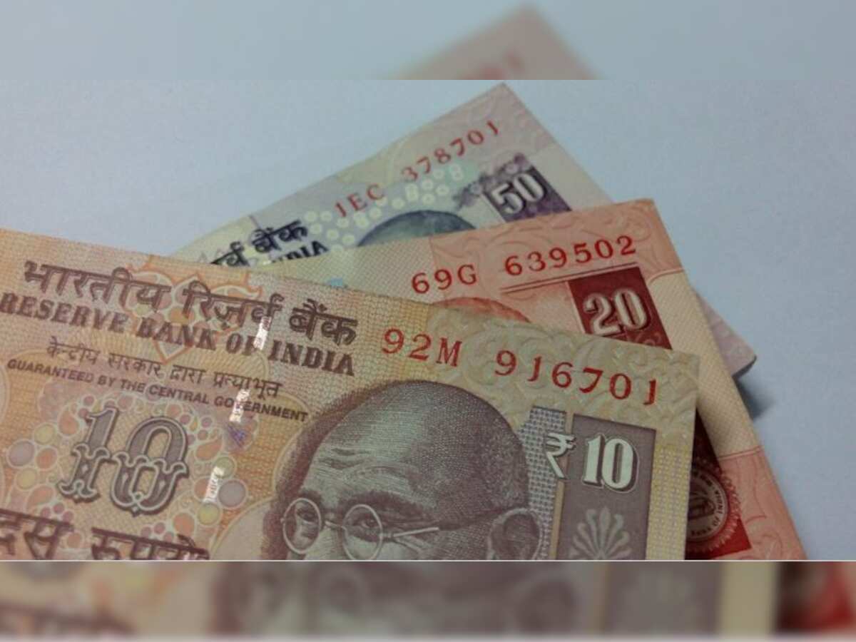 Rupee slips 9 paise to 69.89 vs USD in early trade | Zee Business