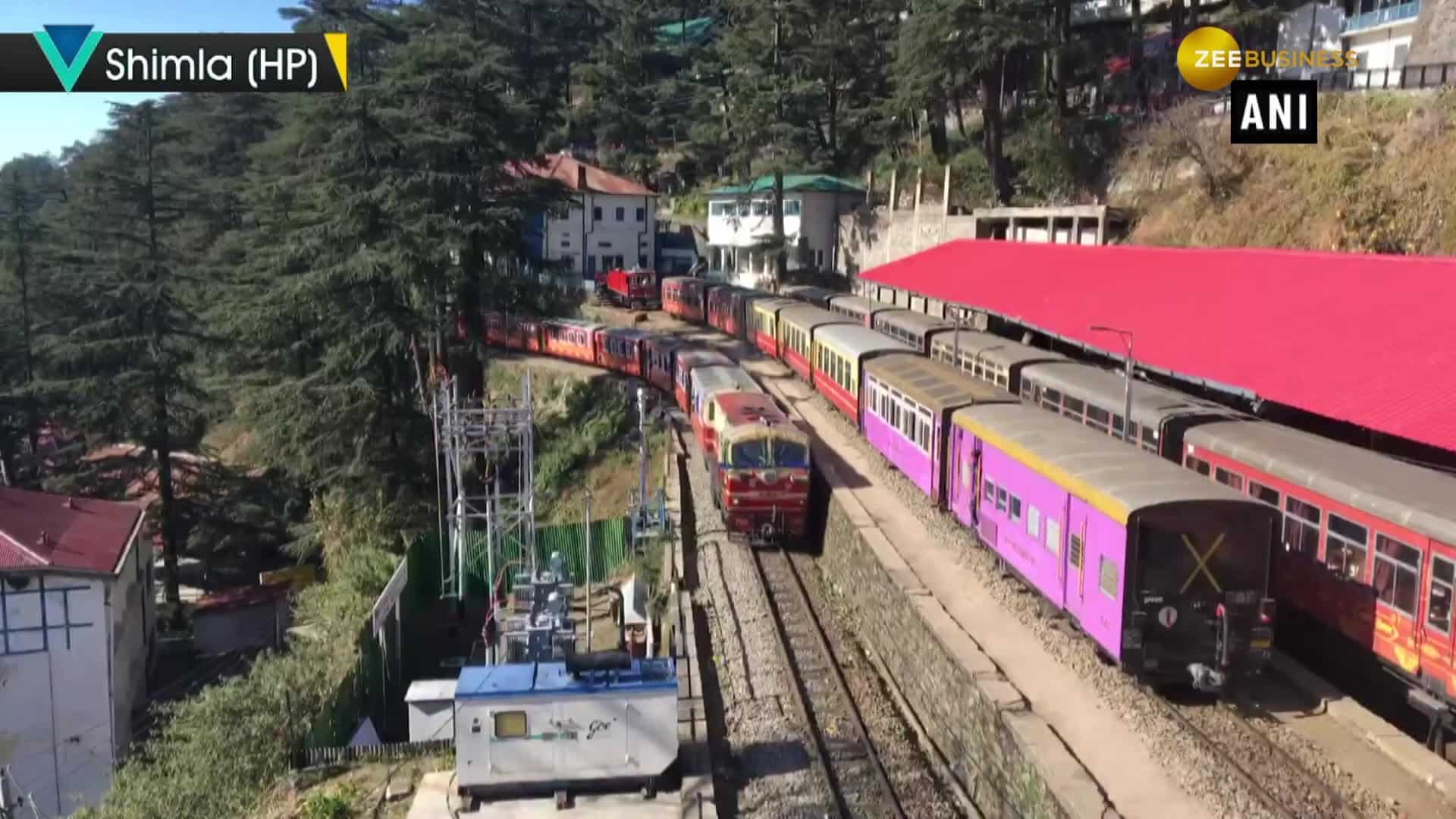 Tourists enjoy panoramic view of mountains in Vistadome train on Kalka-Shimla route | Zee Business