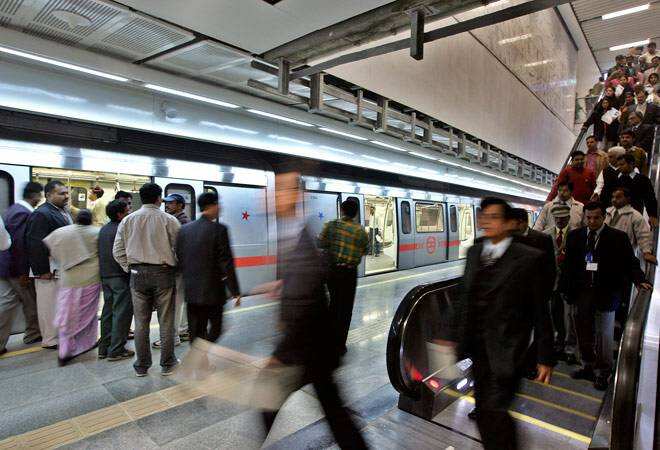 How to book Delhi Metro tickets using QR code | Zee Business