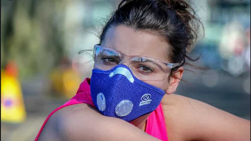 Built of face mask is key in stopping droplet spread | Zee Business