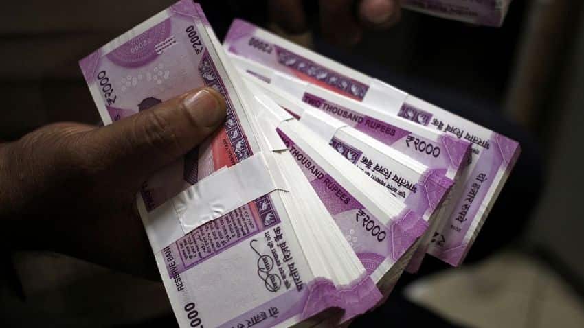 Rupee rises 22 paise to 76.78 against US dollar in early trade | Zee ...