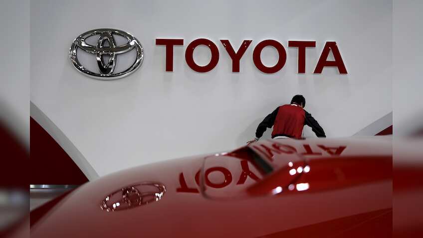 Toyota's new president vows to step up electric vehicle push