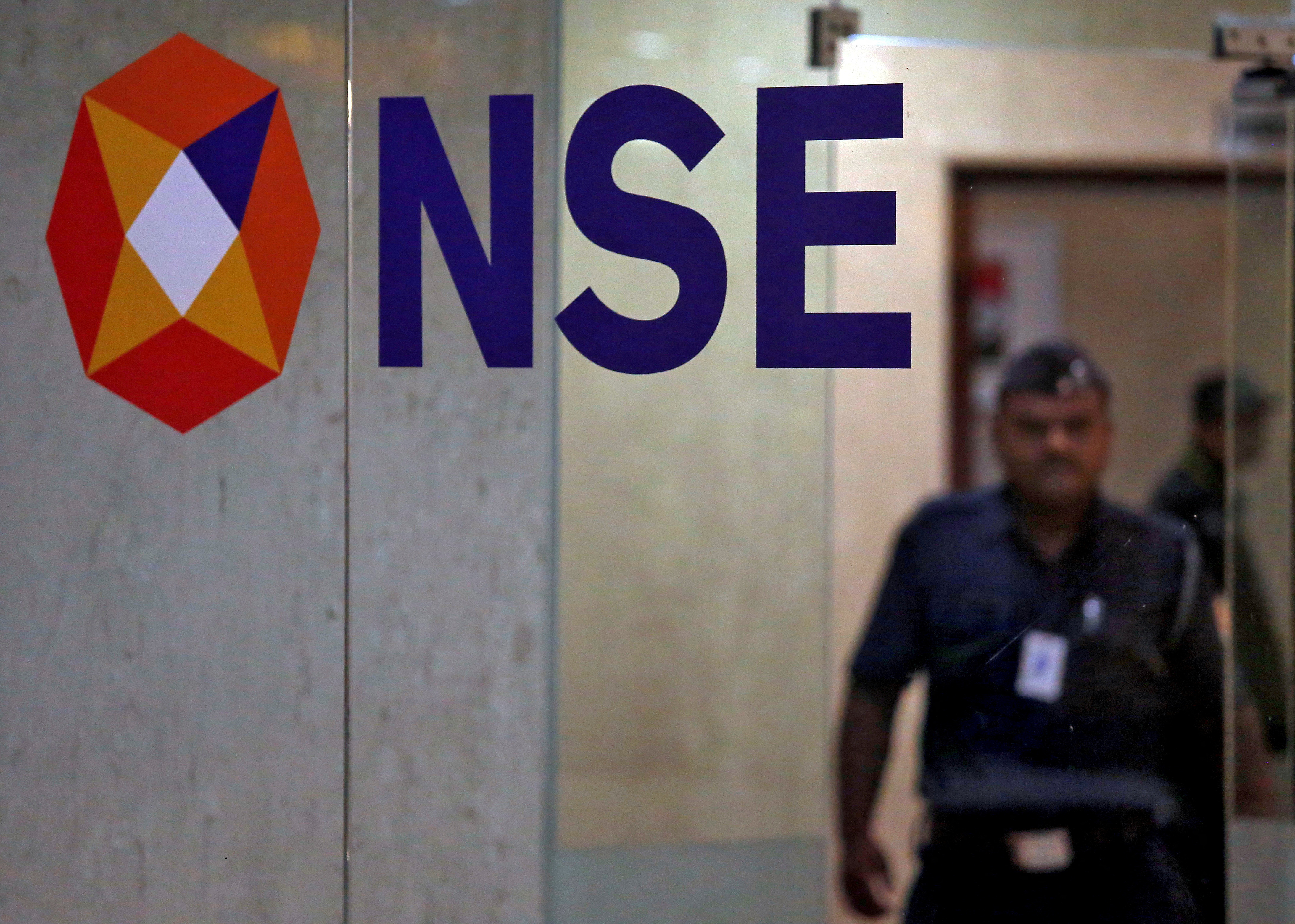 NSE halves lot size for Nifty 50 derivatives trading | Zee Business NSE halves lot size for Nifty 50 derivatives trading | Zee Business