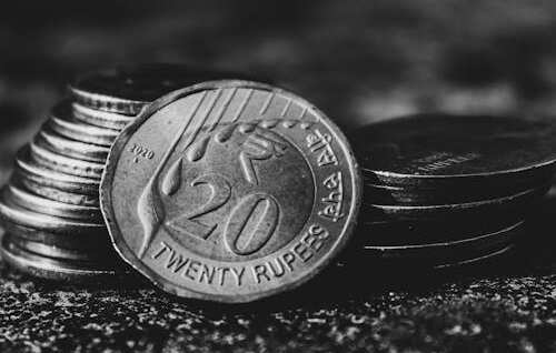 Rupee inches higher vs dollar, off record low | Zee Business