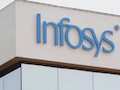 Infosys shares surge after record Rs 18,000-crore buyback announcement | Zee Business